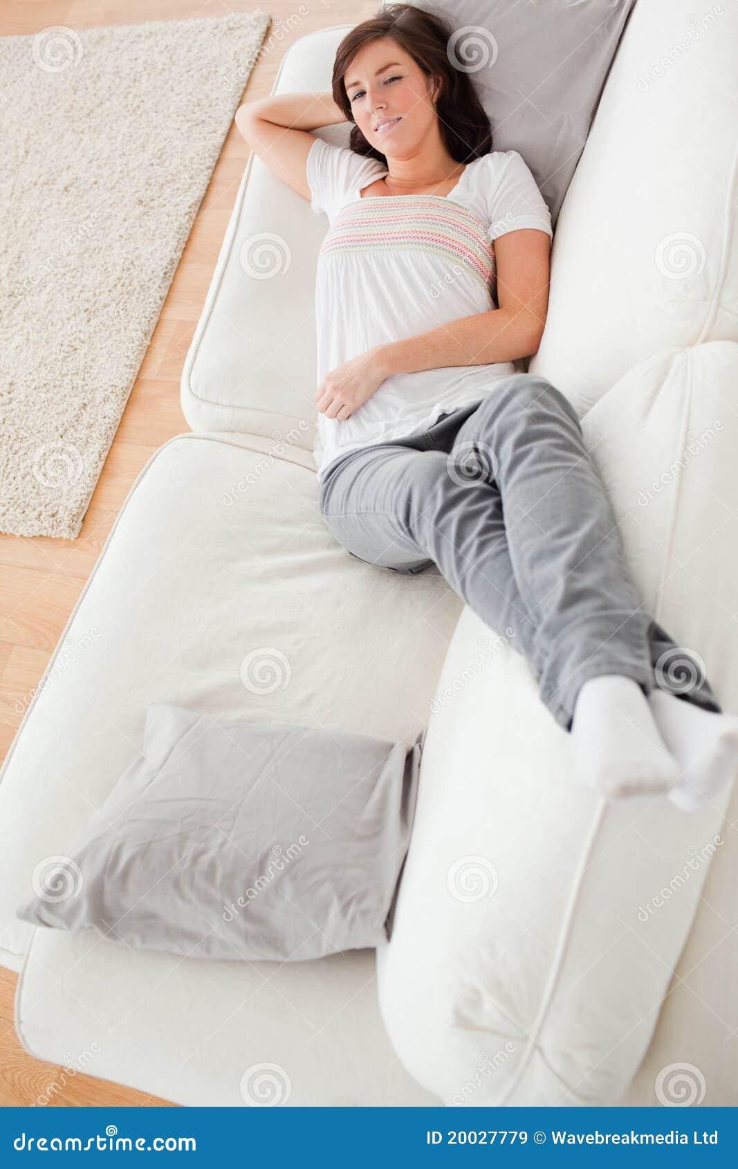 Young Beautiful Female Having a Rest on a Sofa Stock Image - Image of ...
