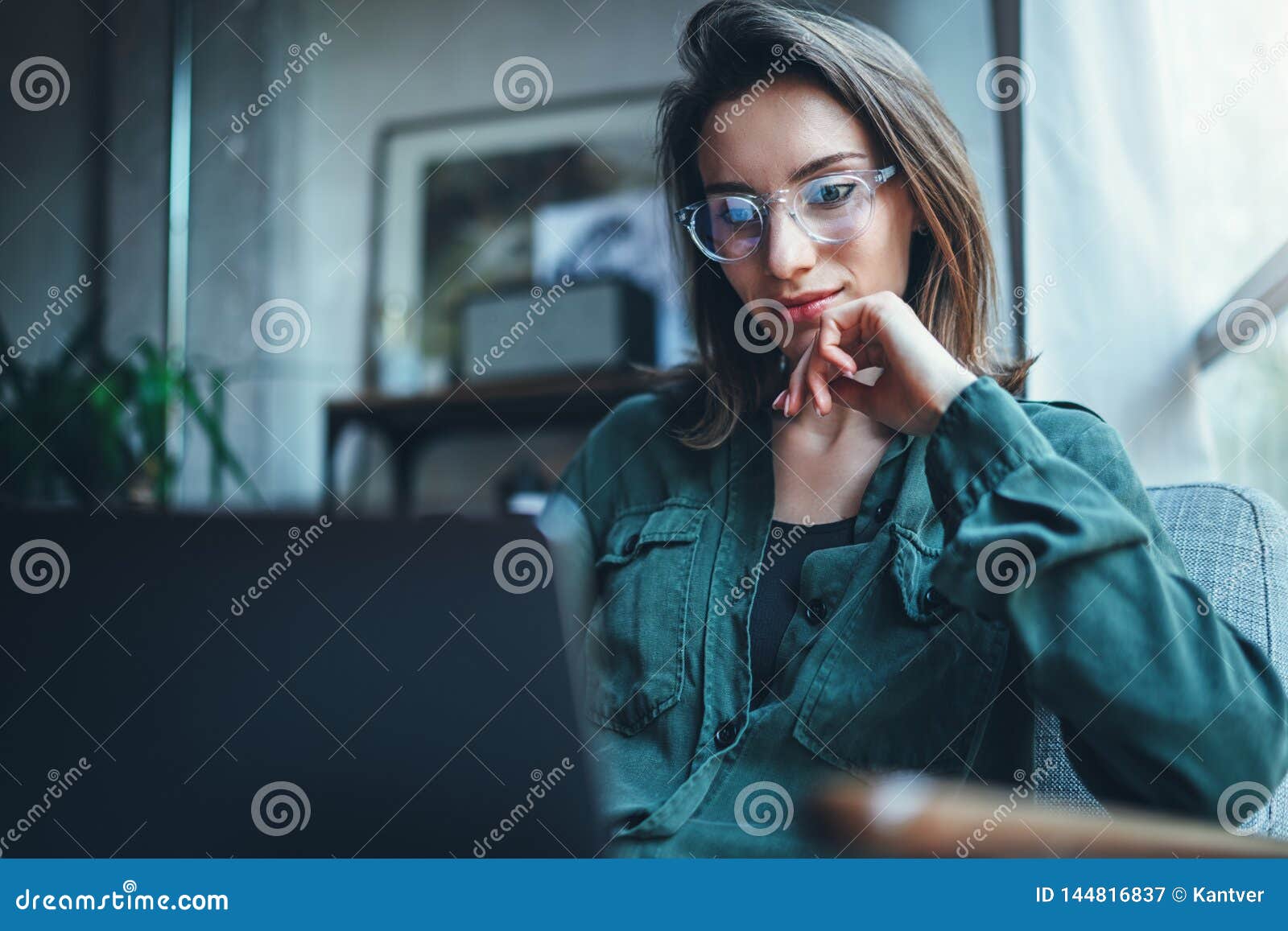 Young Beautiful Female Model Sitting at the Comfortable Armchair and ...
