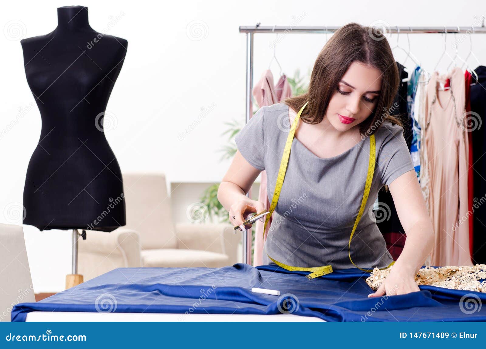 The Young Beautiful Female Tailor Taking Measurements Stock Image ...