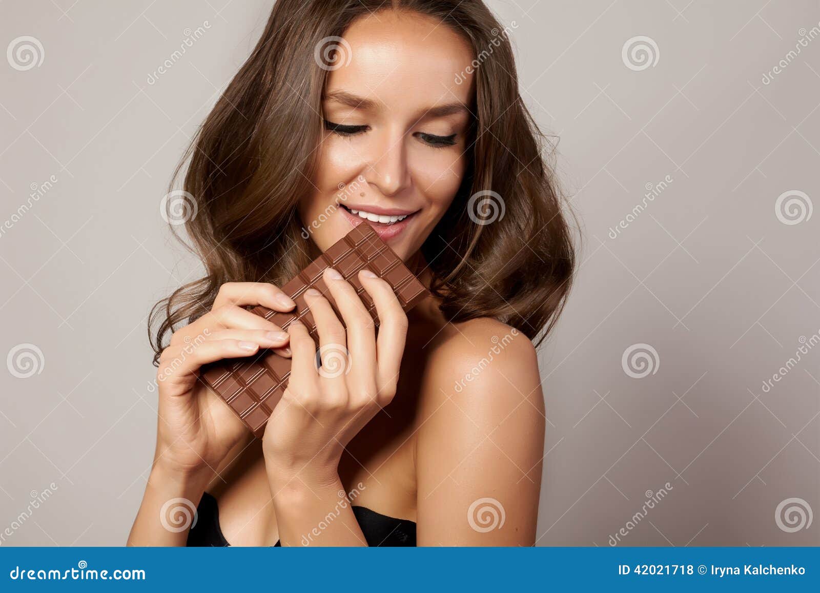 Young Beautiful Girl With Dark Curly Hair Bare Shoulders And Neck