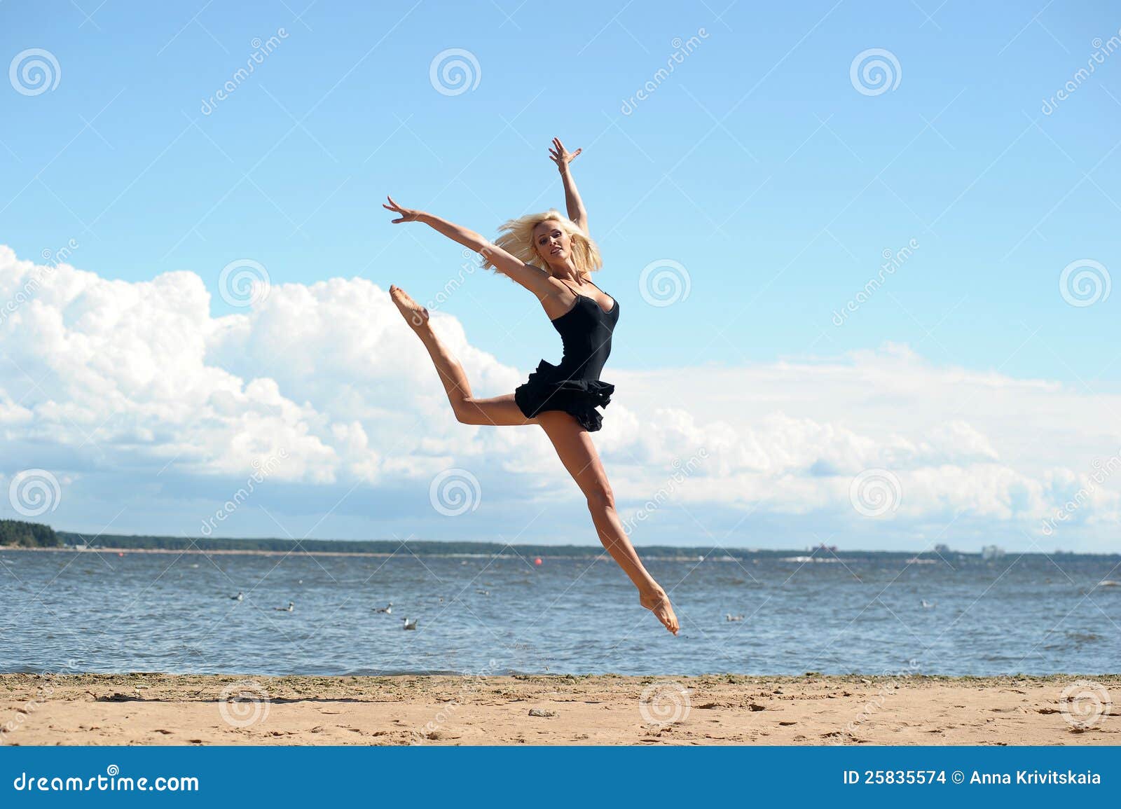Young Beautiful Girl Doing Gymnastic Jumps Outdoors Stock Photo - Image ...