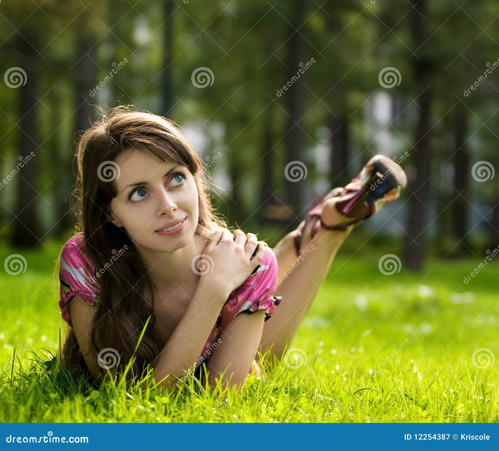 Young Beautiful Girl on a Grass Stock Image - Image of cheerful, mature ...