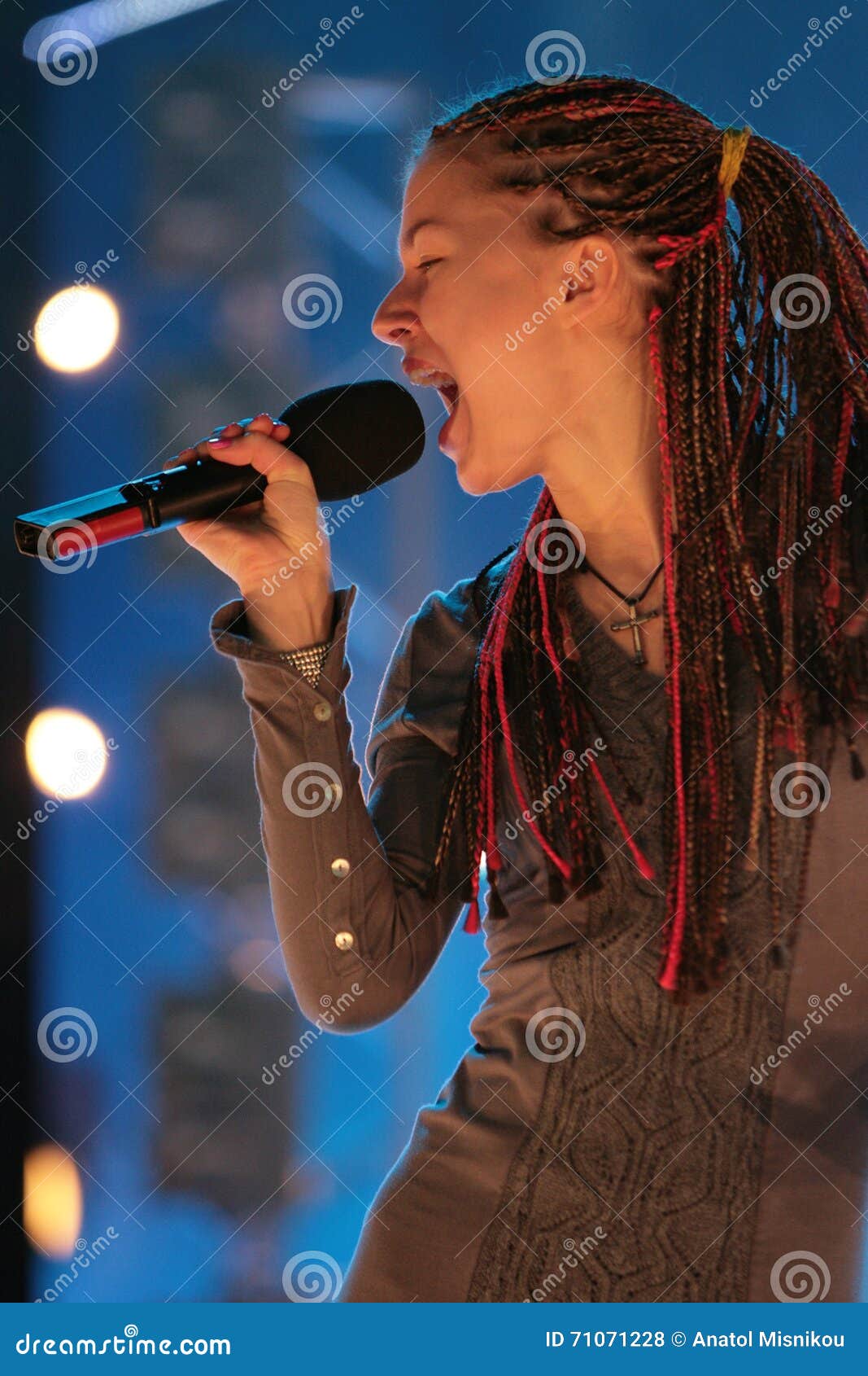 Young Beautiful Girl with a Microphone in Hand Stock Photo - Image of ...