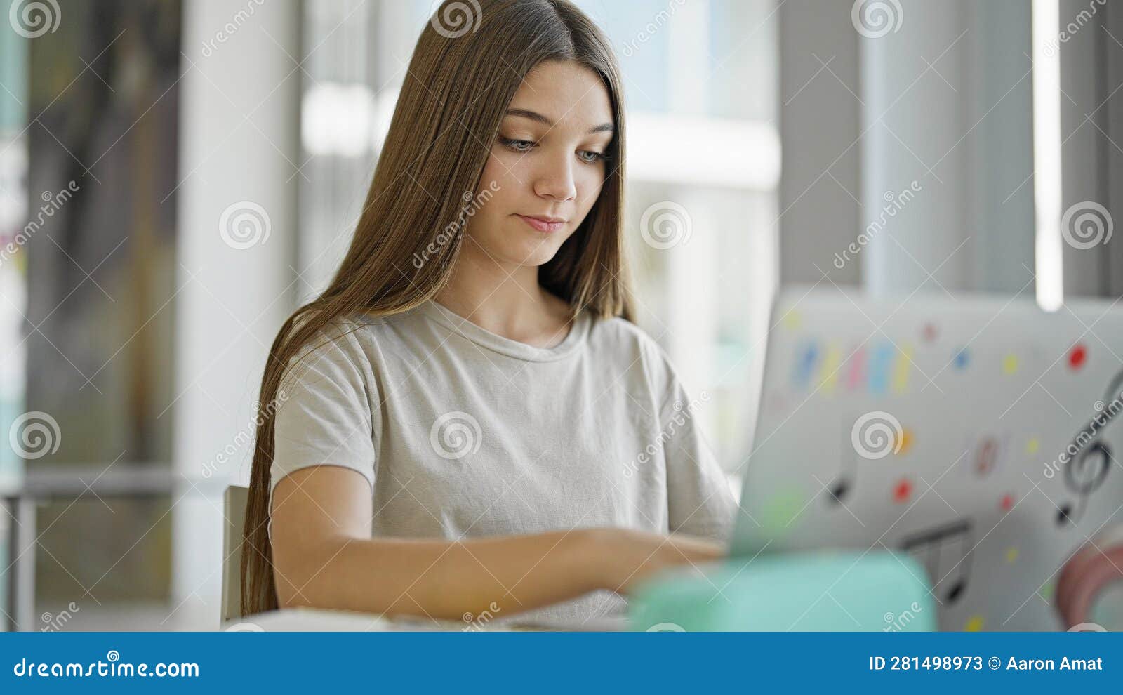 Young Beautiful Girl Student Using Laptop Studying at Library Stock ...