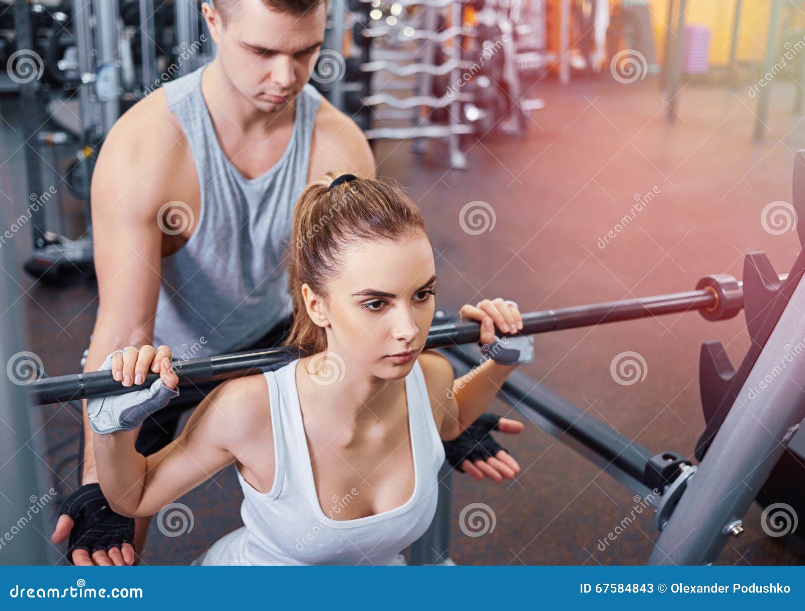 Young, Beautiful Girl Training with the Coach in the Gym. Stock Image ...