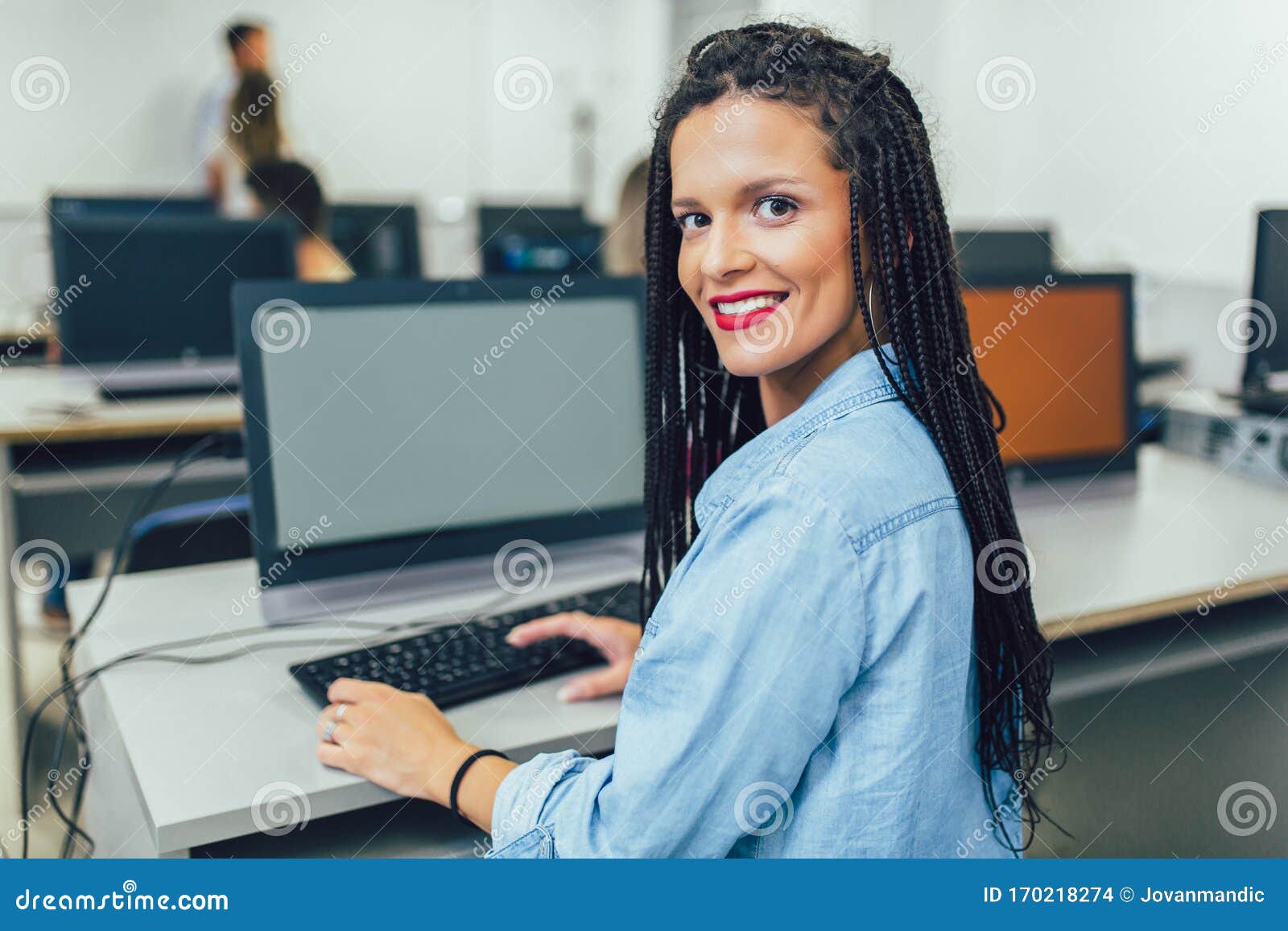 Beautiful Girl Working on a Computer in a Classroom Stock Photo - Image ...