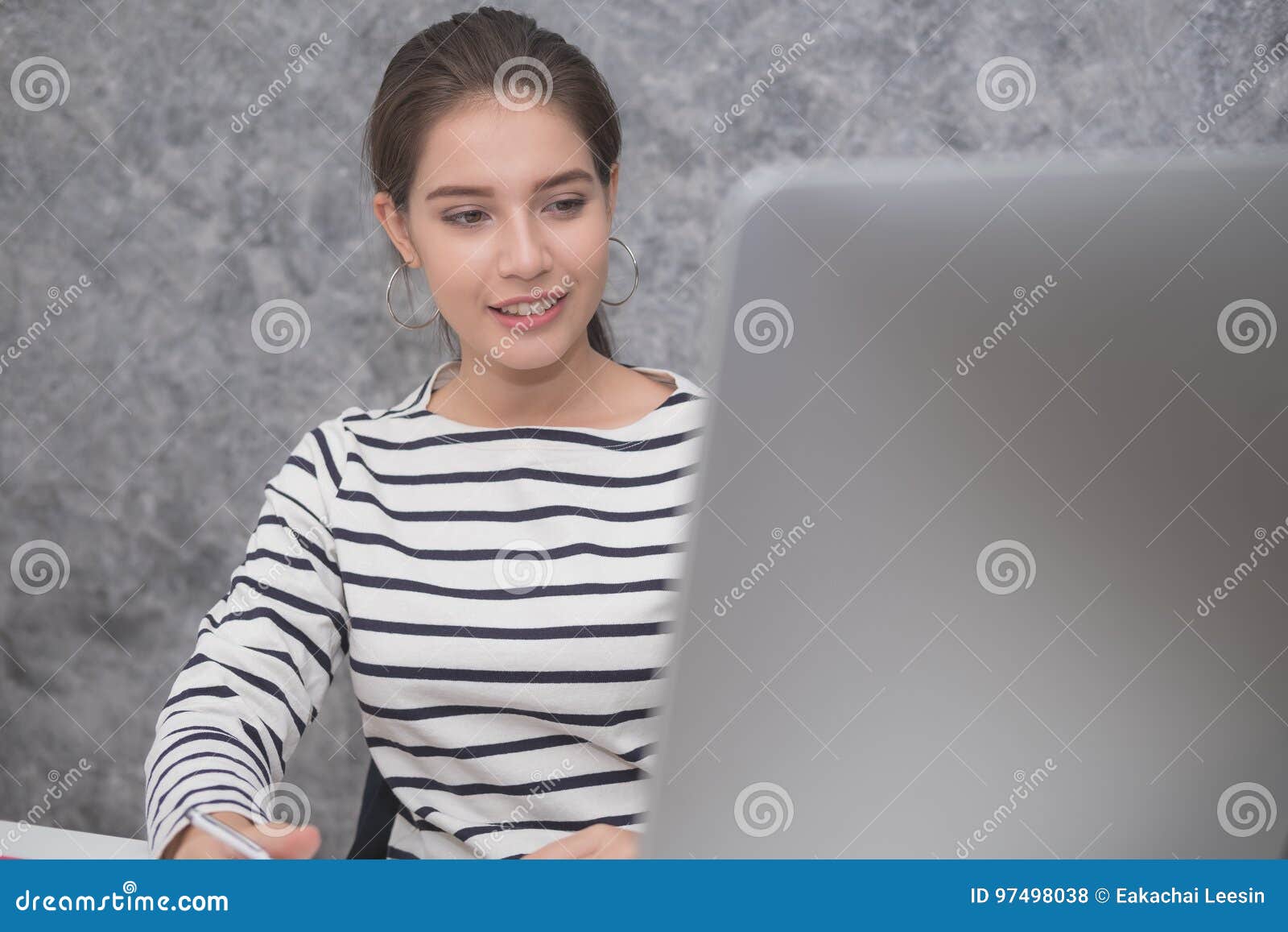 Young Beautiful Girl Working on the Laptop at the Office Stock Photo ...