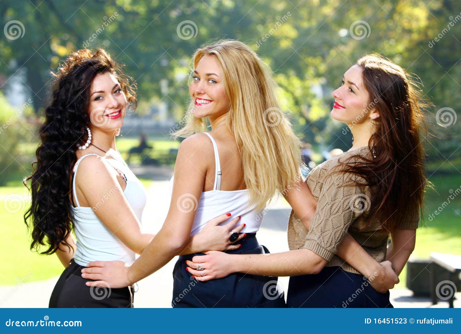 Young And Beautiful Girlfriends Have Fun In Park Stock Image Image Of