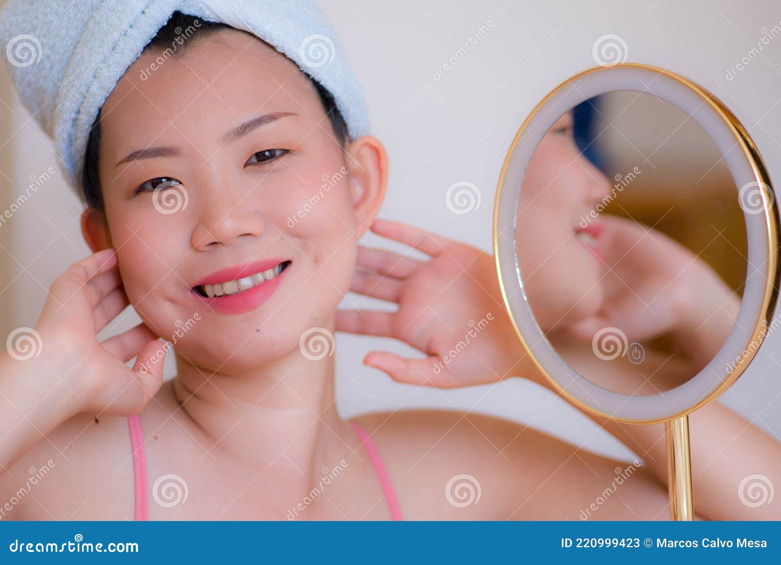 Young Beautiful And Happy Asian Chinese Woman With Towel Head Wrap
