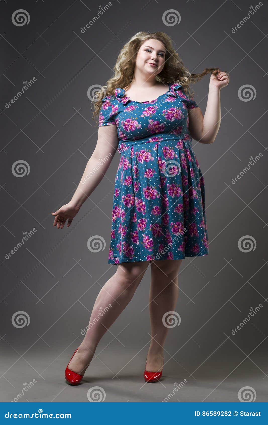 Young Beautiful Happy Blonde Plus Size Model In Dress And Shoes Xxl