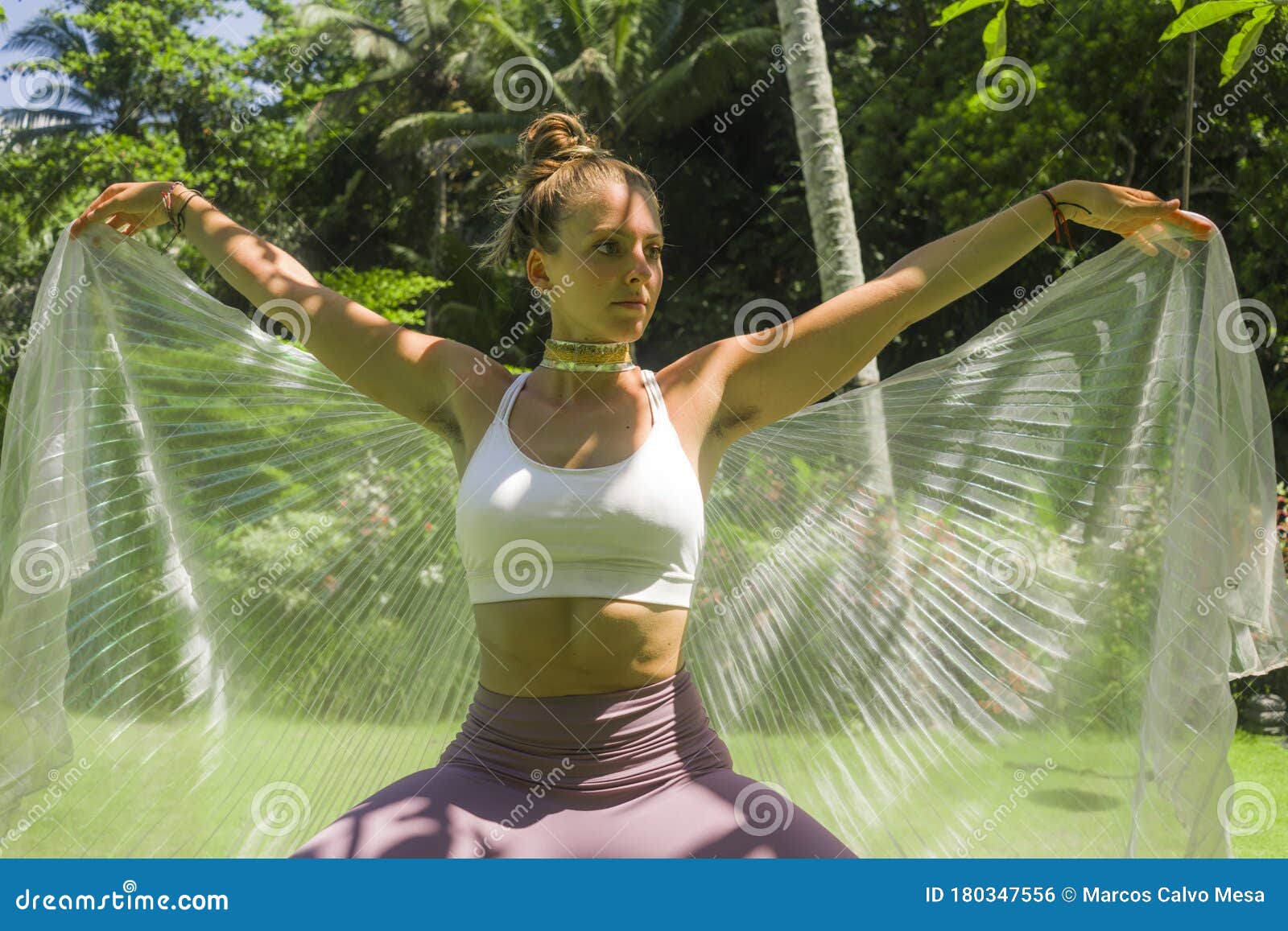 Young Beautiful And Happy Woman Doing Outdoors Yoga Workout