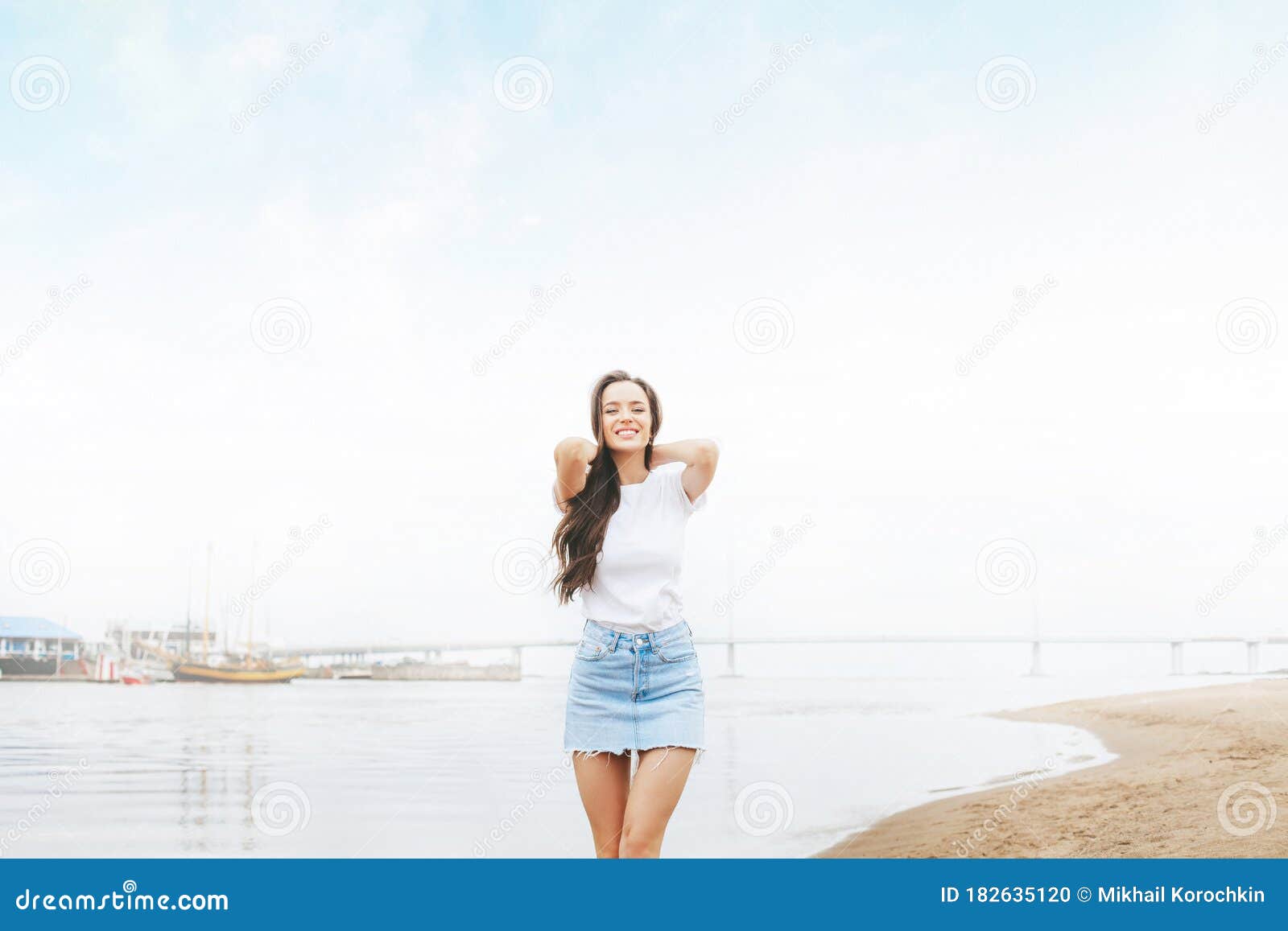 Young Beautiful Happy Woman Walks on Beach in Marina Stock Photo ... Young Beautiful Happy Woman Walks on Beach in Marina Stock Photo ...