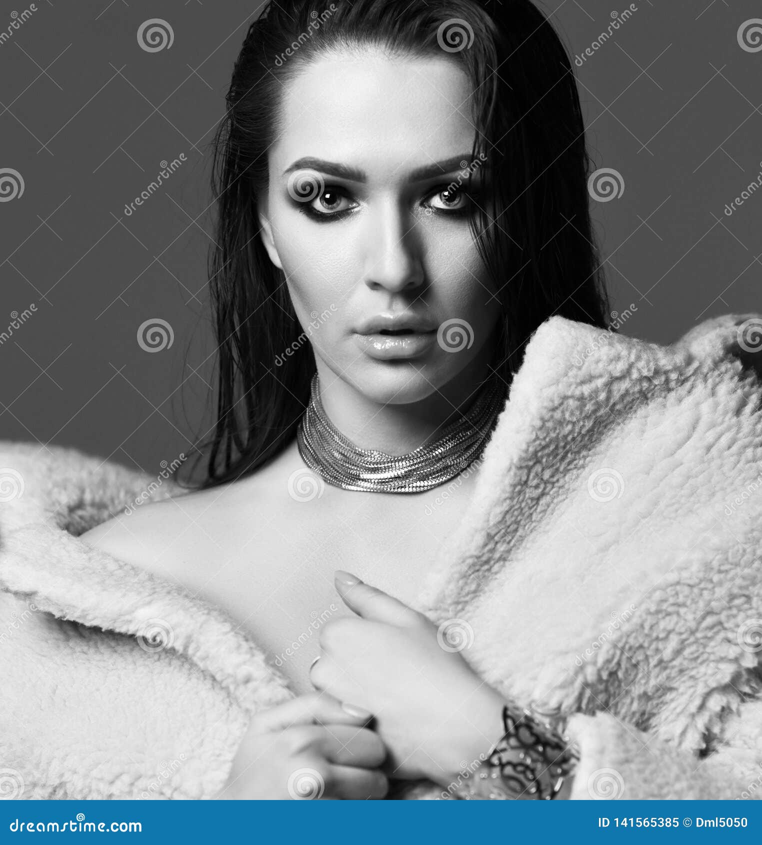 Young Beautiful Hipster Girl Posing in Fur Spring Jacket and Expensive ... Young Beautiful Hipster Girl Posing in Fur Spring Jacket and Expensive ...