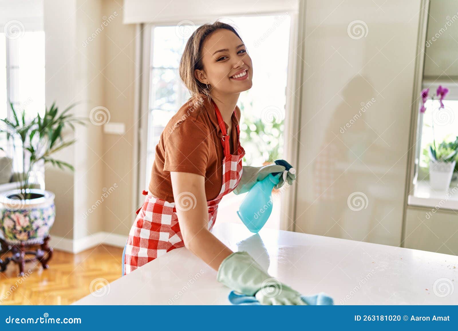 Young Beautiful Hispanic Woman Smiling Confident Cleaning Table at the ...