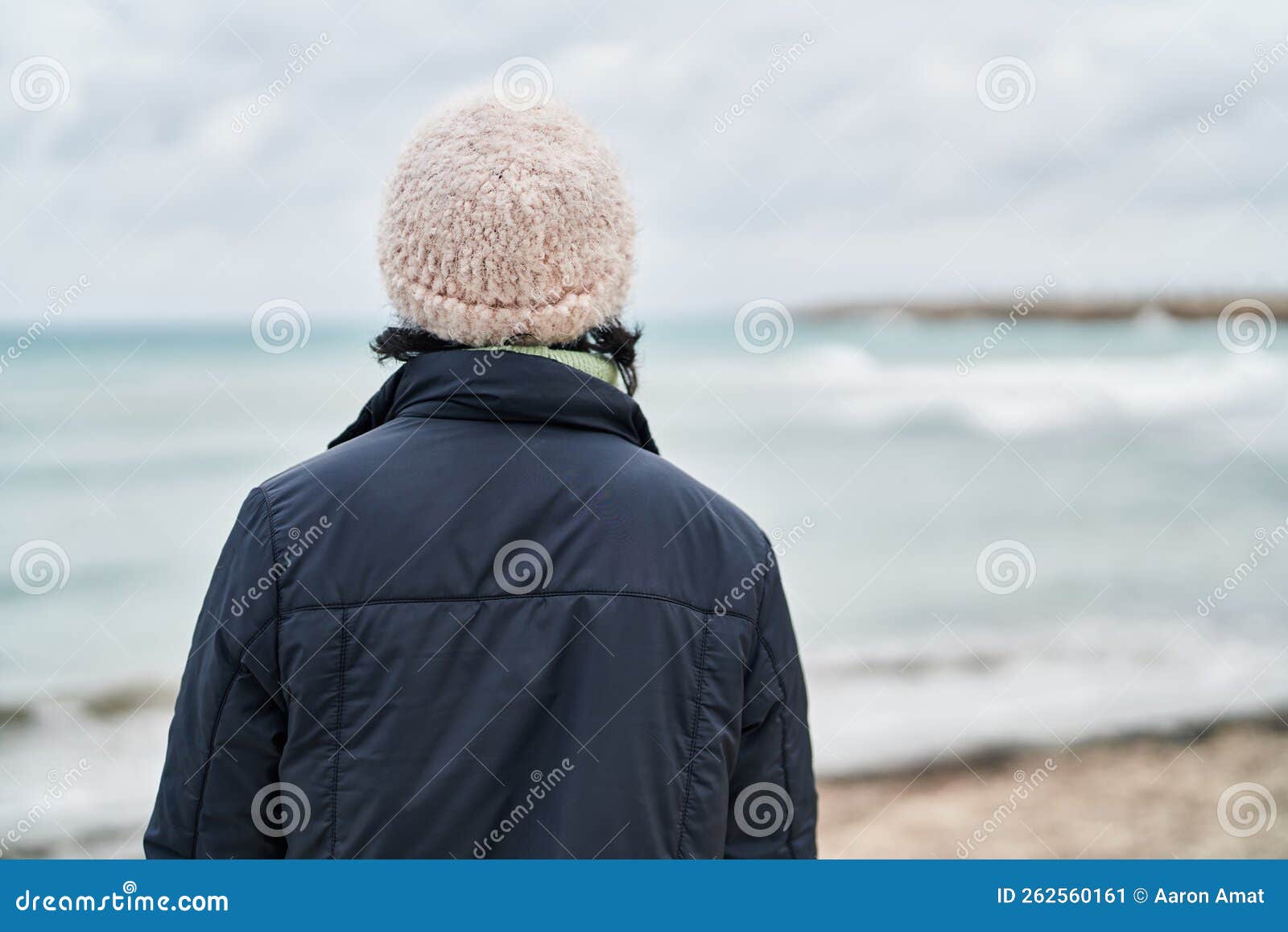 Young Beautiful Hispanic Woman Standing on Back View at Seaside Stock ...