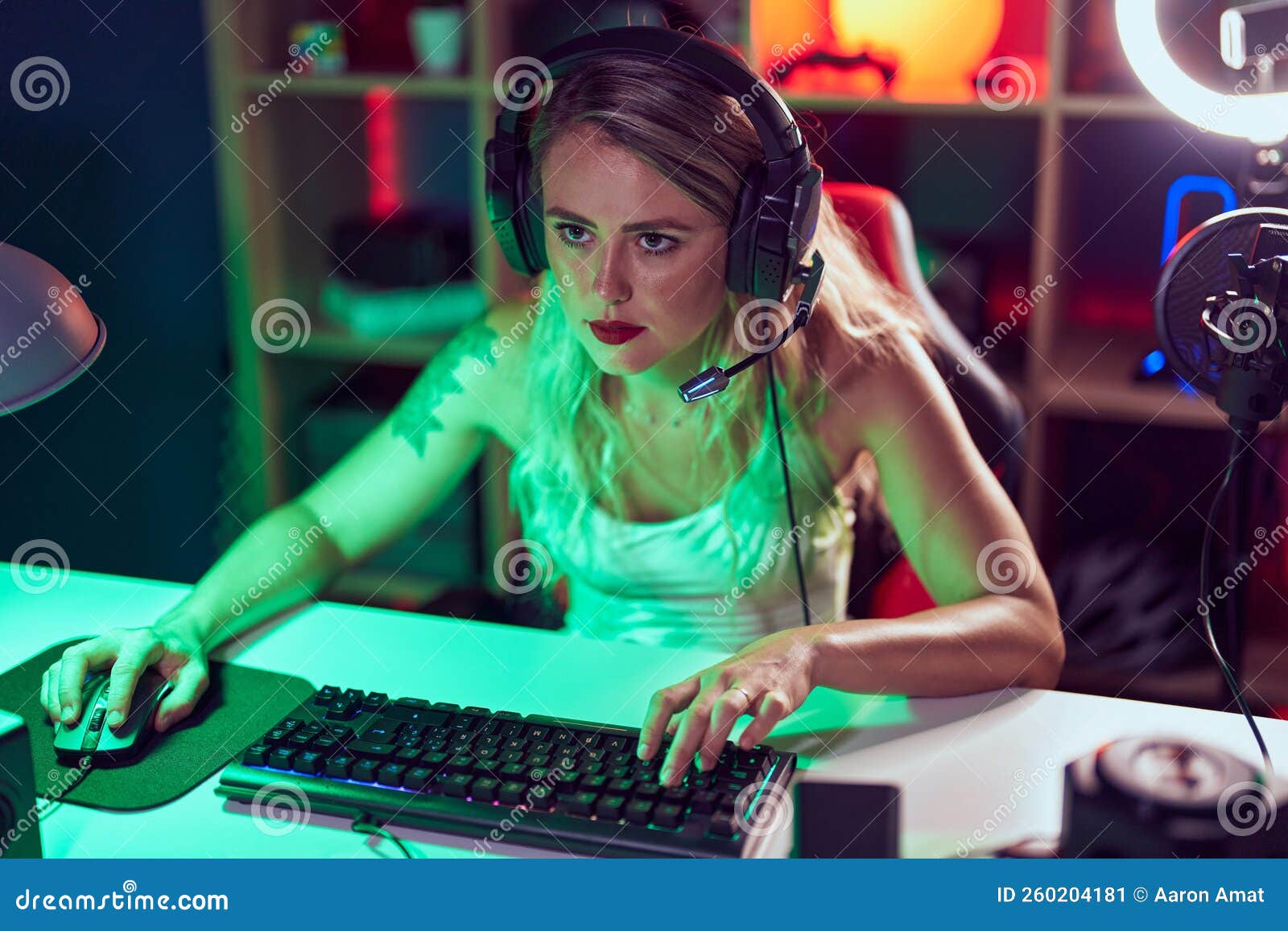 Young Beautiful Hispanic Woman Streamer Playing Video Game Using ...