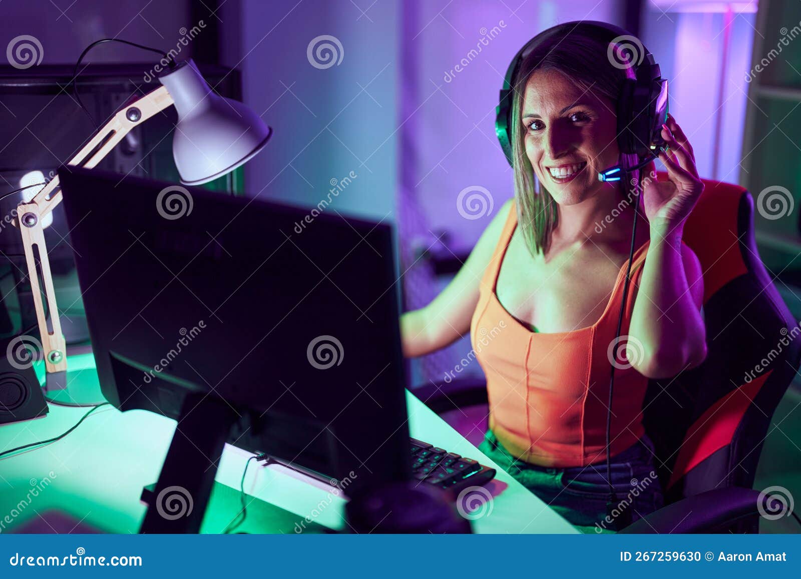 Young Beautiful Hispanic Woman Streamer Playing Video Game Using ...