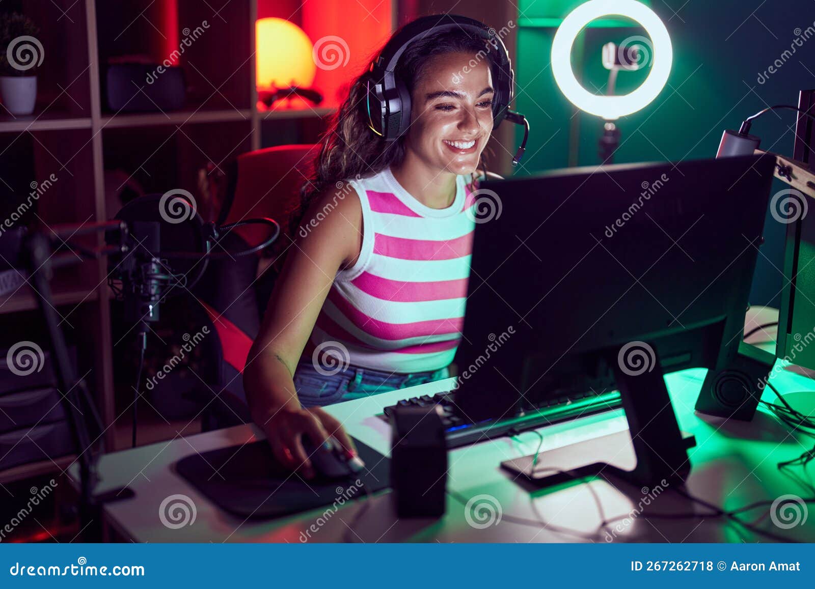 Young Beautiful Hispanic Woman Streamer Playing Video Game Using ...