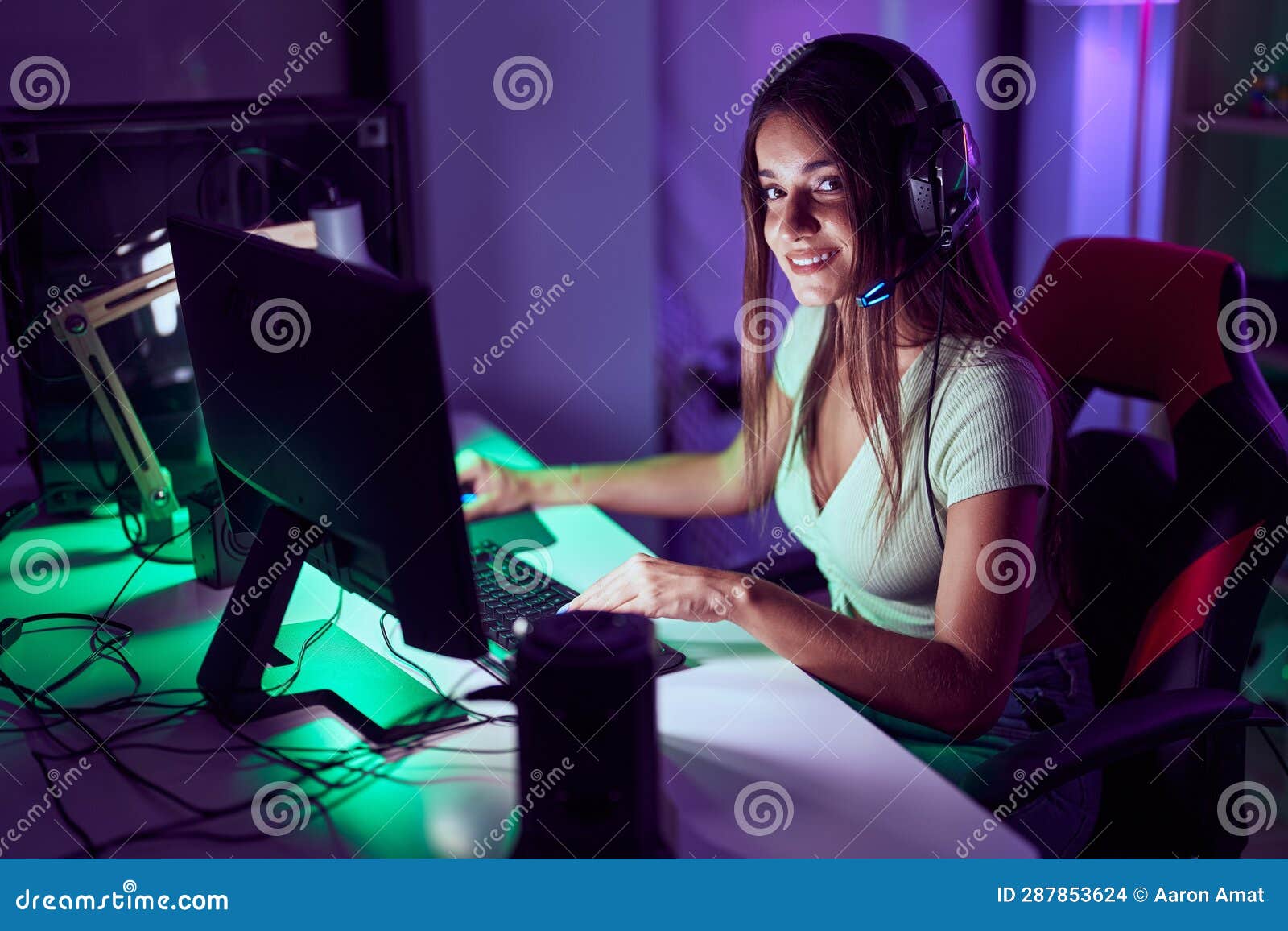 Young Beautiful Hispanic Woman Streamer Playing Video Game Using ...