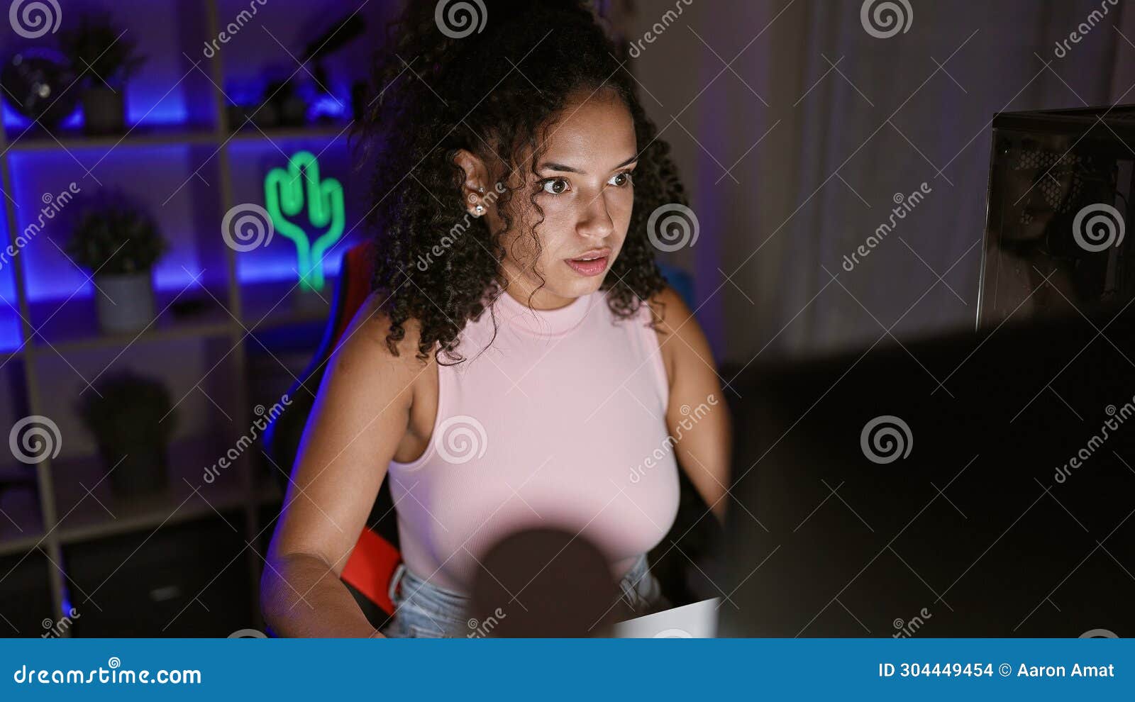 Young Beautiful Hispanic Woman Streamer Playing Video Game Using ...