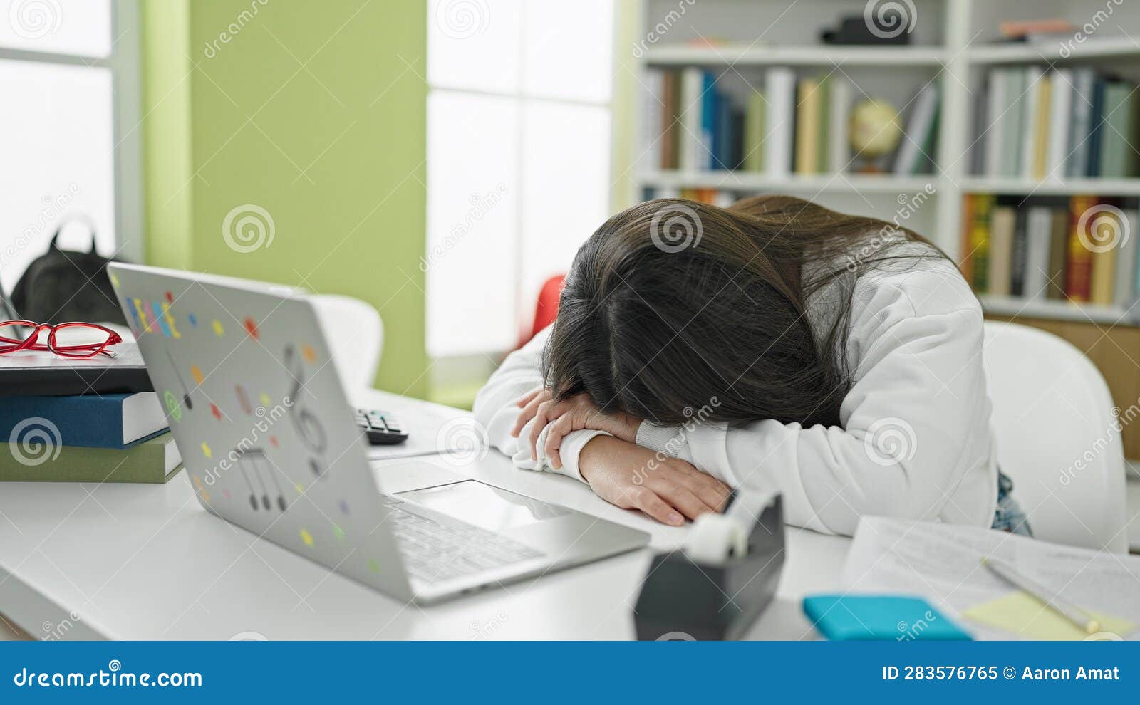 Young Beautiful Hispanic Woman Student Sleeping with Head on Table at ...