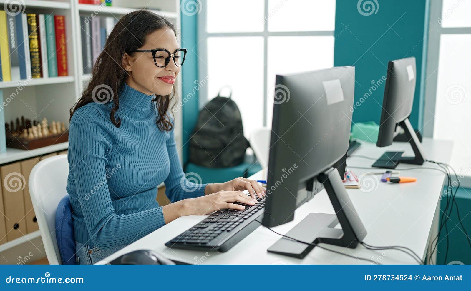 Young Beautiful Hispanic Woman Student Using Computer Smiling Wearing ...