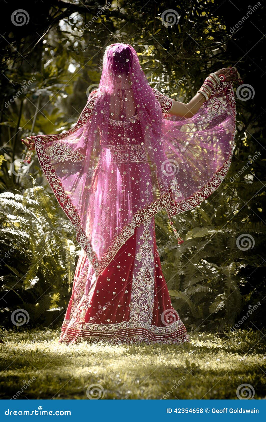 Young Beautiful Indian Hindu Bride Dancing Under Tree Stock Photo ...