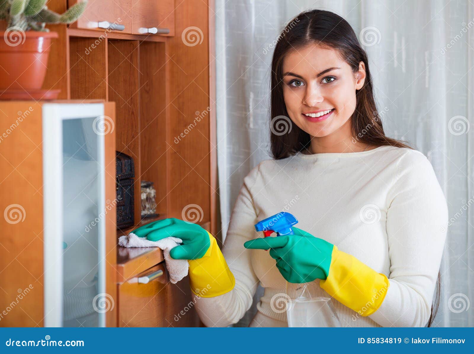 Young Beautiful Long-haired Woman Doing Regular Clean-up Stock Image ...