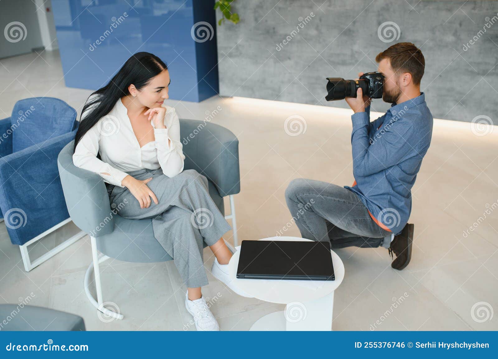 Young Beautiful Model Posing for Professional Photographer in Studio ...