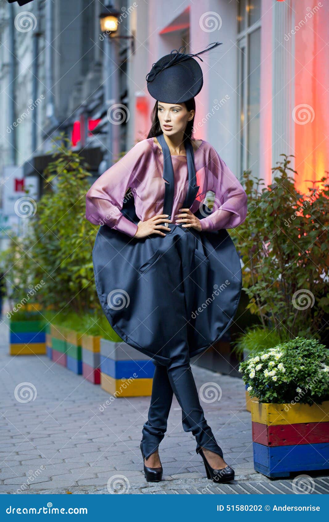 Young Beautiful Model in a Stylish Designer Clothes Stock Photo - Image ...