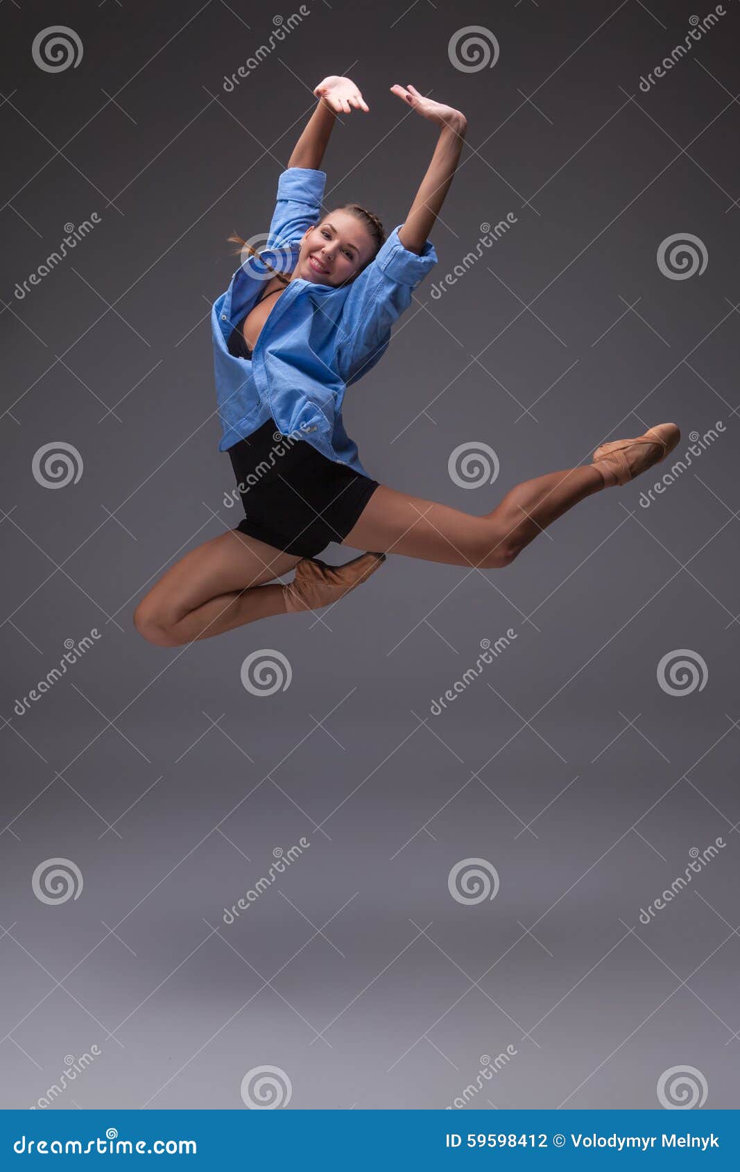 Young Beautiful Modern Style Dancer Jumping in a Stock Photo - Image of ...