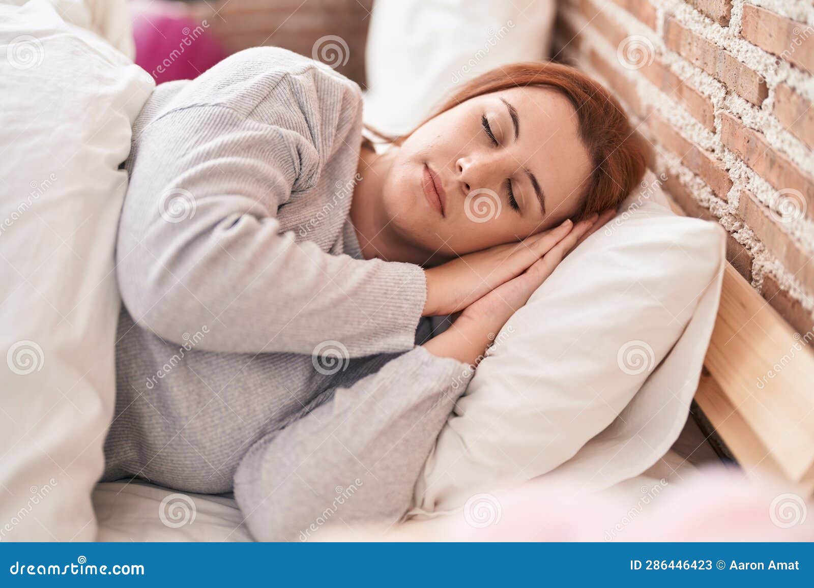 Young Beautiful Plus Size Woman Lying on Bed Sleeping at Bedroom Stock ...
