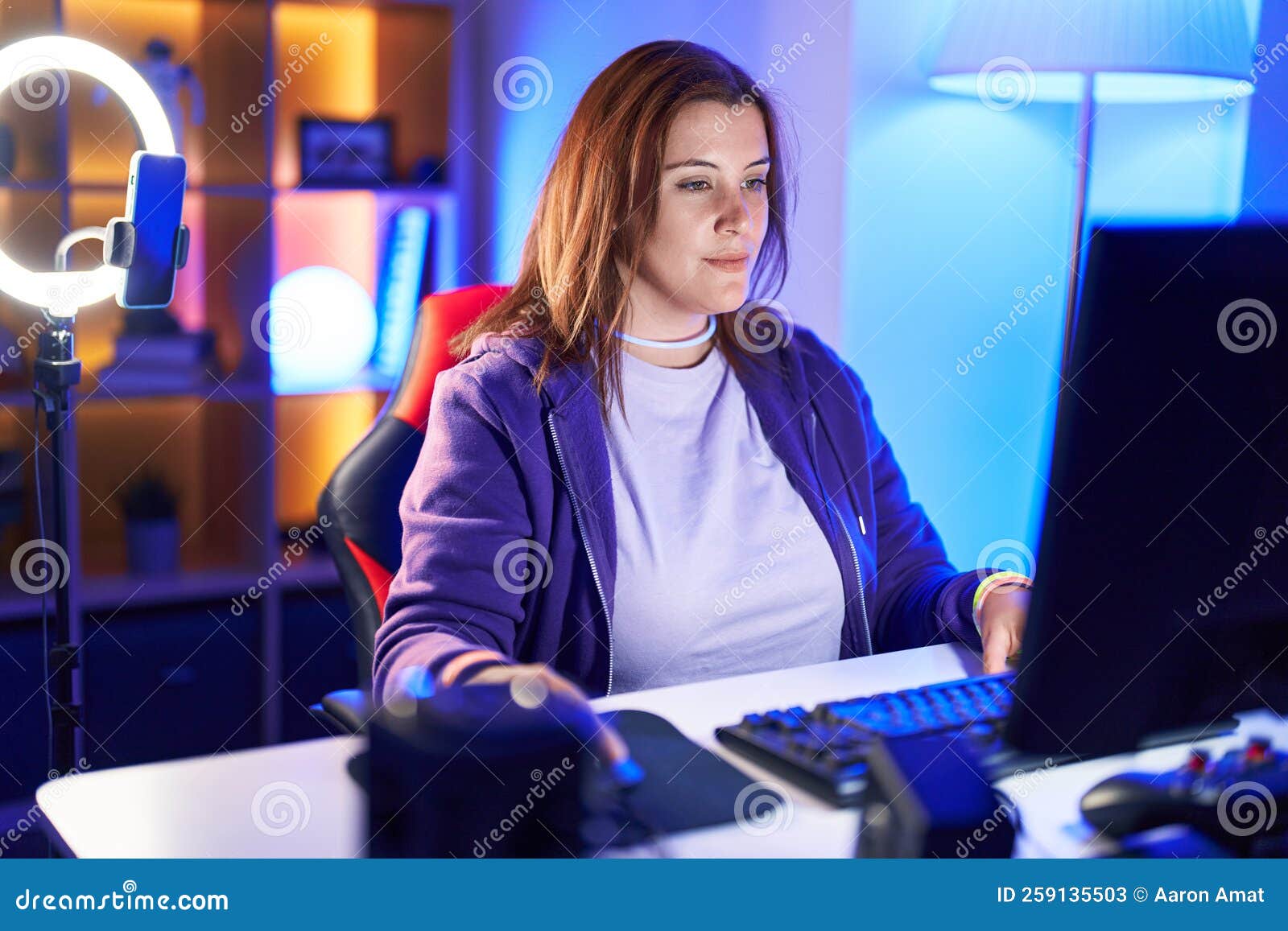 Young Beautiful Plus Size Woman Streamer Playing Video Game Using ...