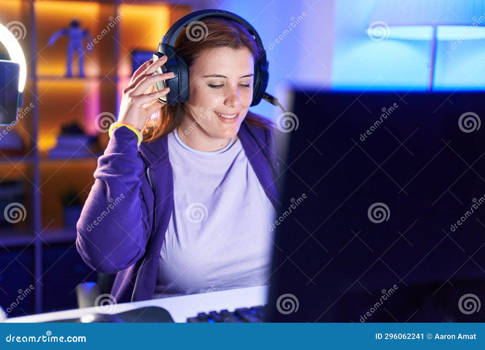 Young Beautiful Plus Size Woman Streamer Playing Video Game Using ...