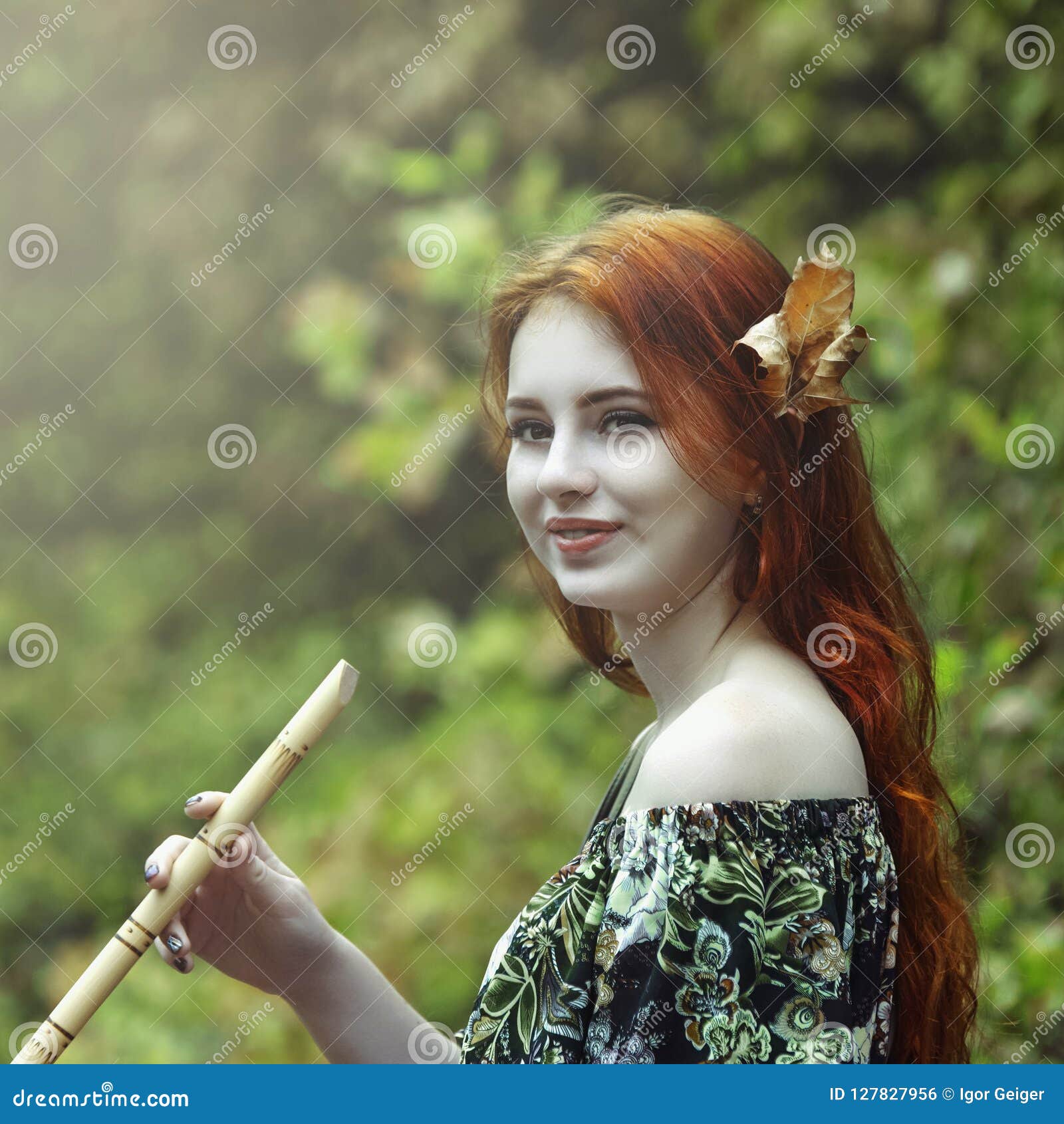 Young Beautiful Red-haired Girl in the Image of an Elf Playing a Stock ...