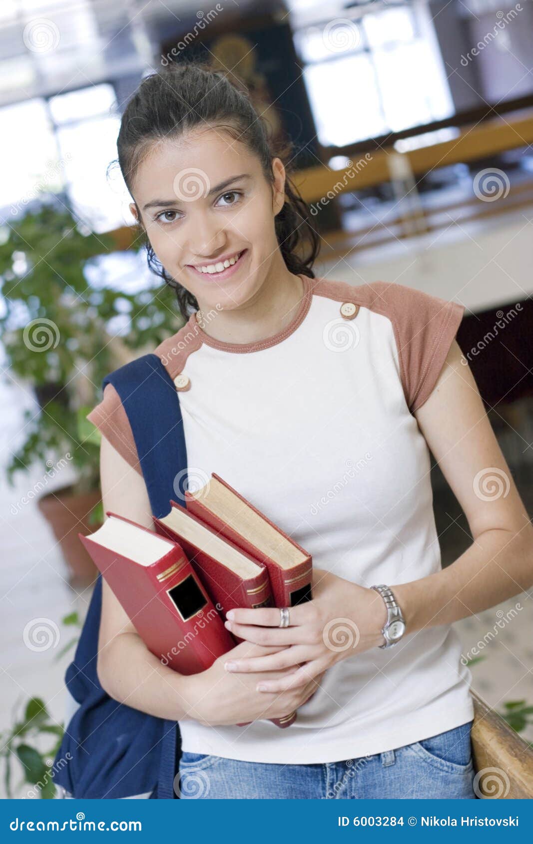 Young Beautiful Student in College Stock Photo - Image of person ...
