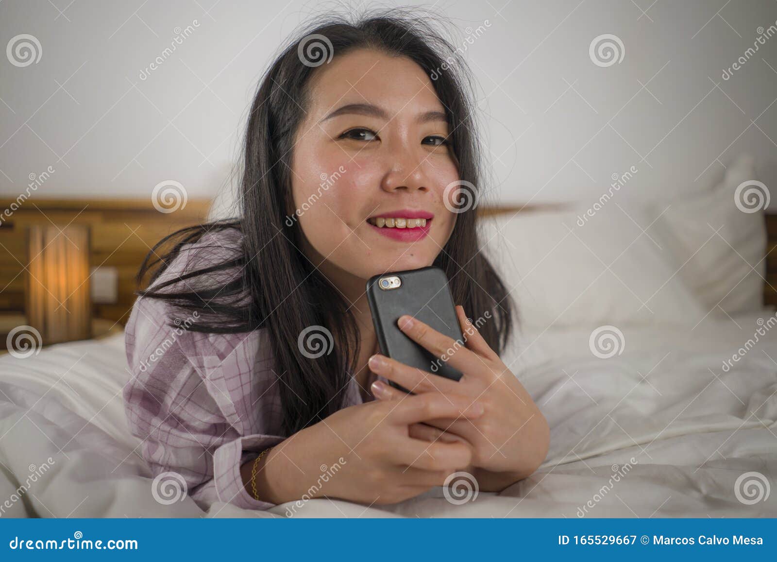 Young Beautiful And Sweet Asian Chinese Woman In Cute Pajamas Playful