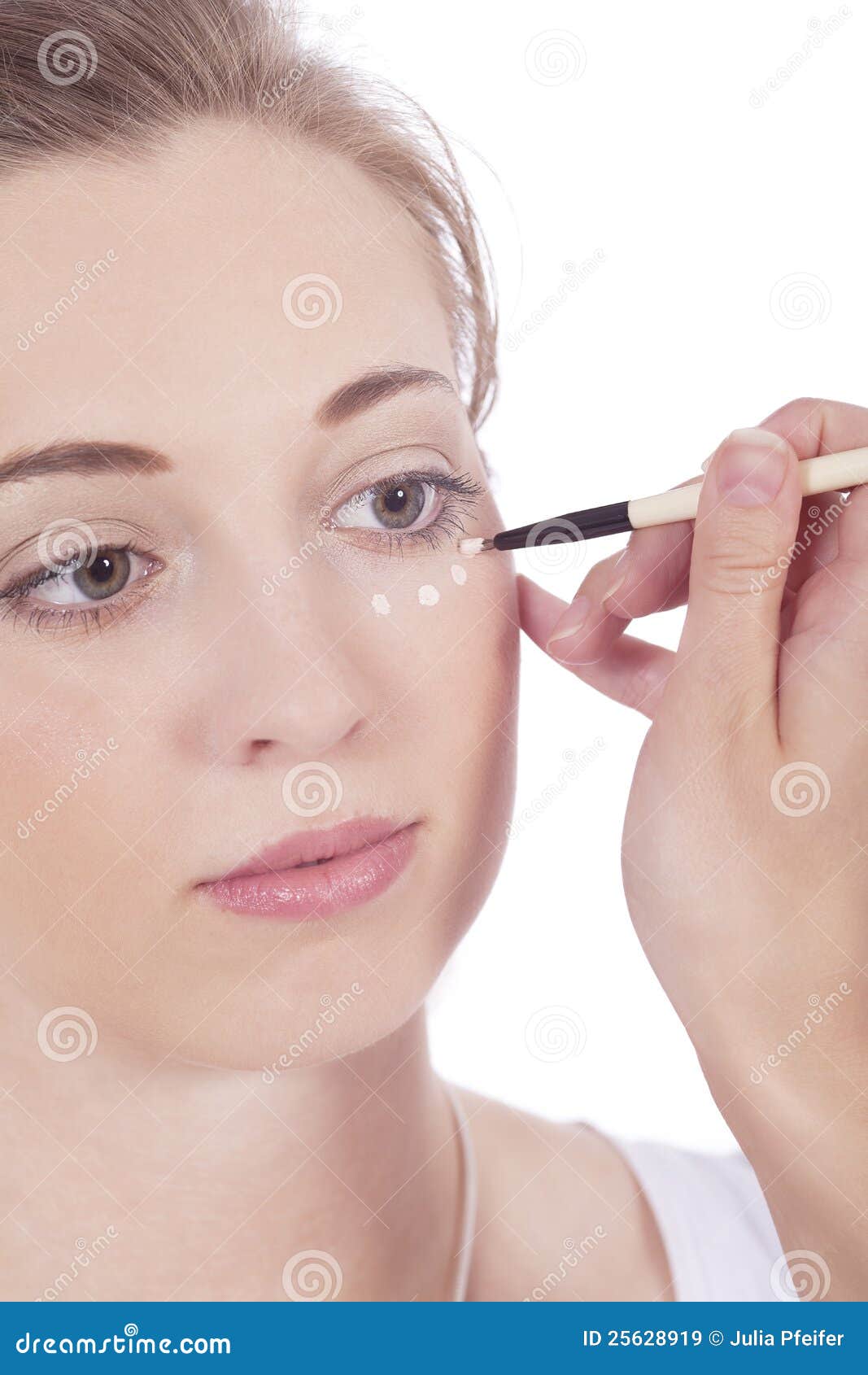 Young Beautiful Woman Applying Concealer on Face Stock Image - Image of ...