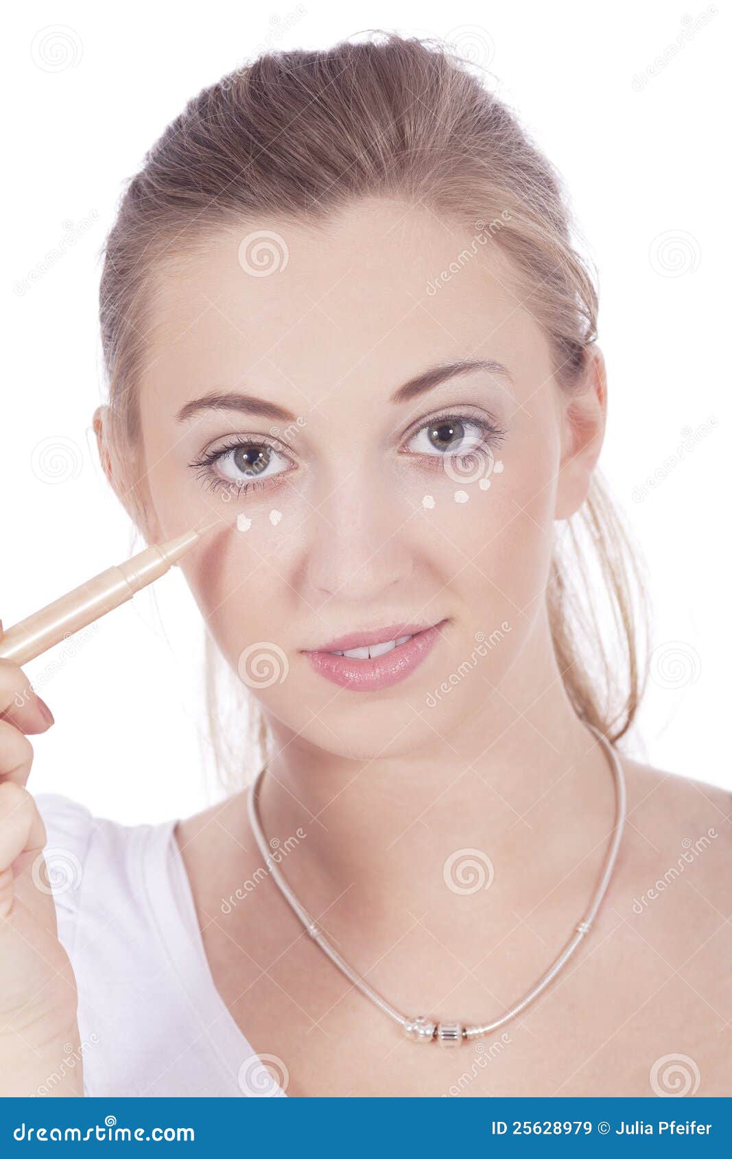 Young Beautiful Woman Applying Concealer on Face Stock Image - Image of ...