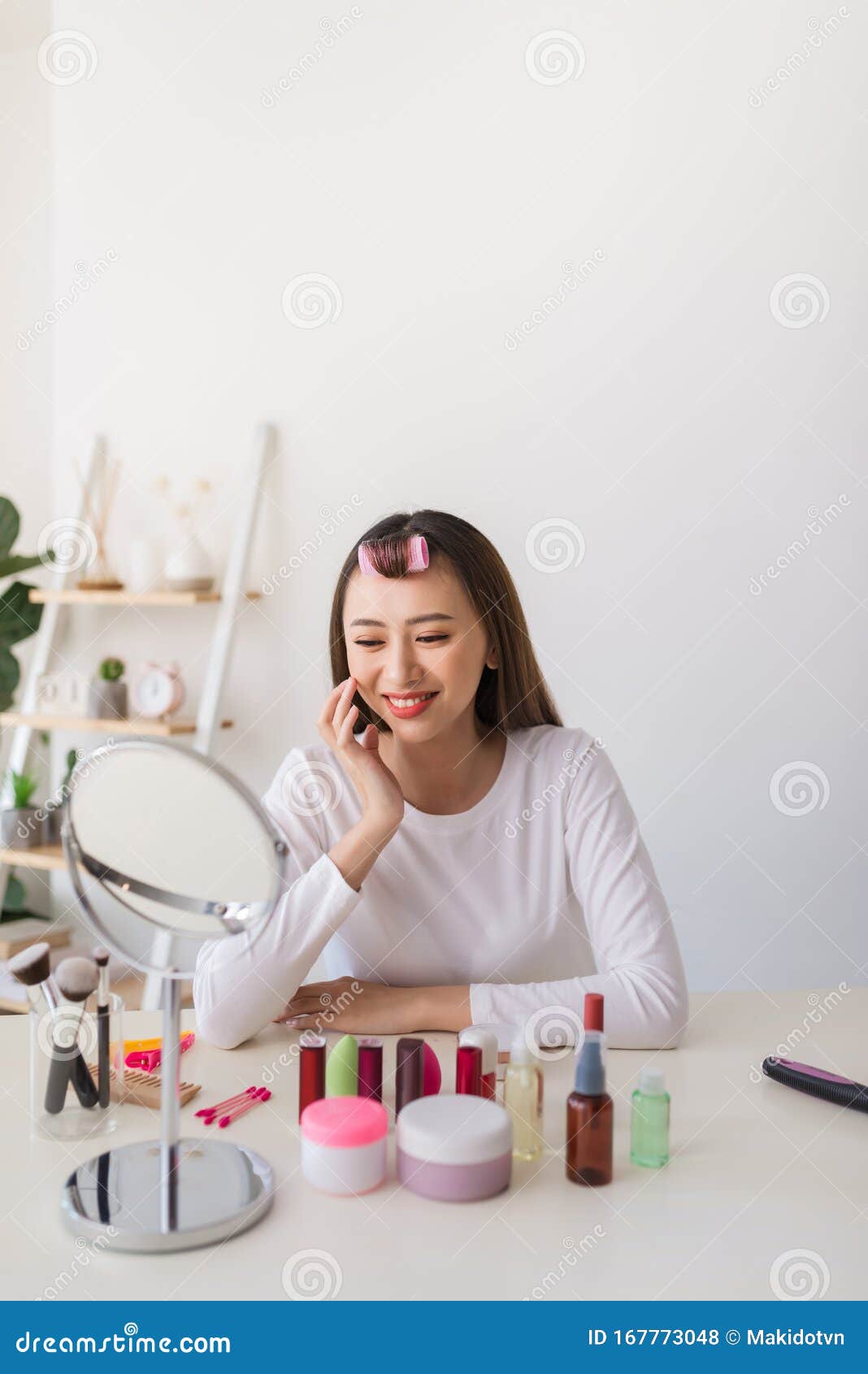 Young Beautiful Woman Applying Her Make-up Stock Photo - Image of ...