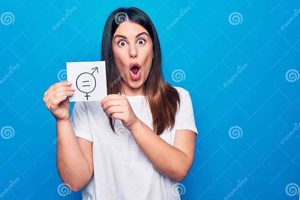 Young Beautiful Woman Asking For Sex Discrimination Holding Paper With