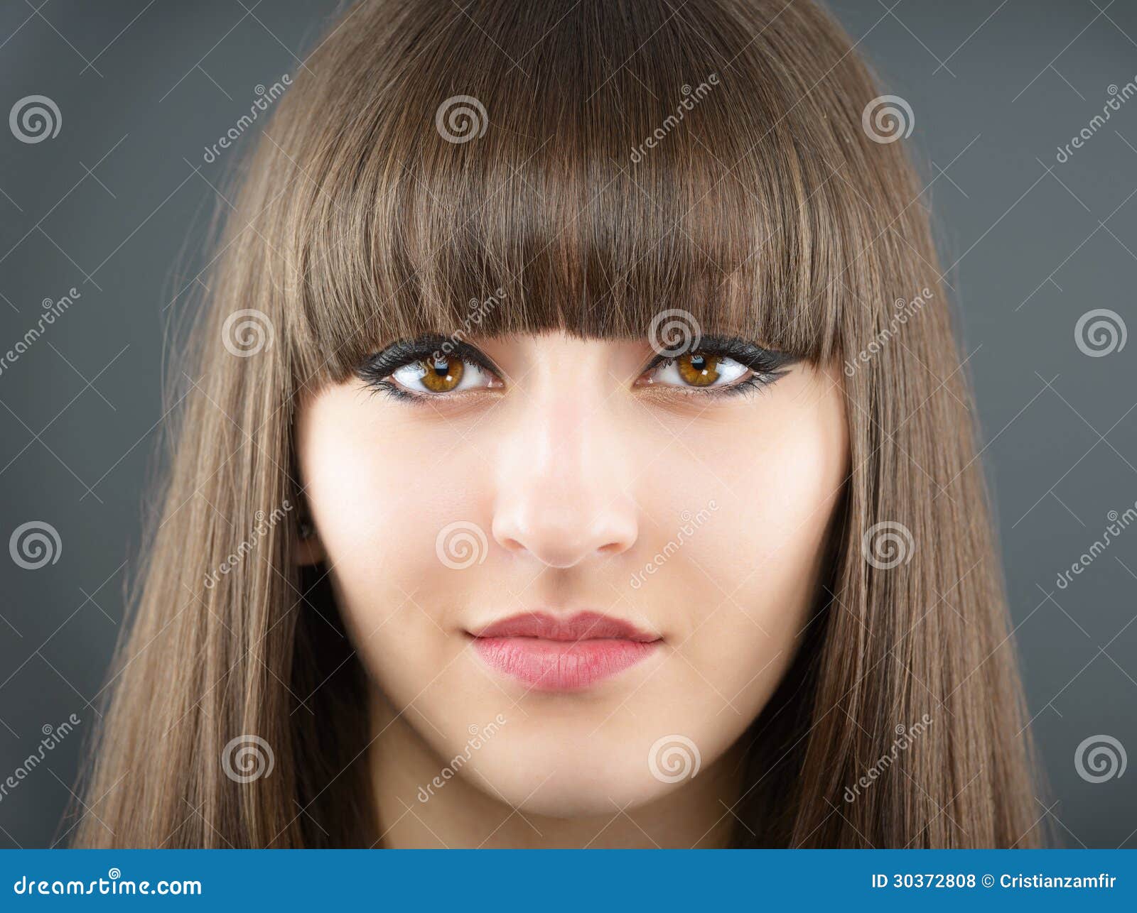 A Young Beautiful Woman with Bangs in Studio Stock Photo - Image of ...