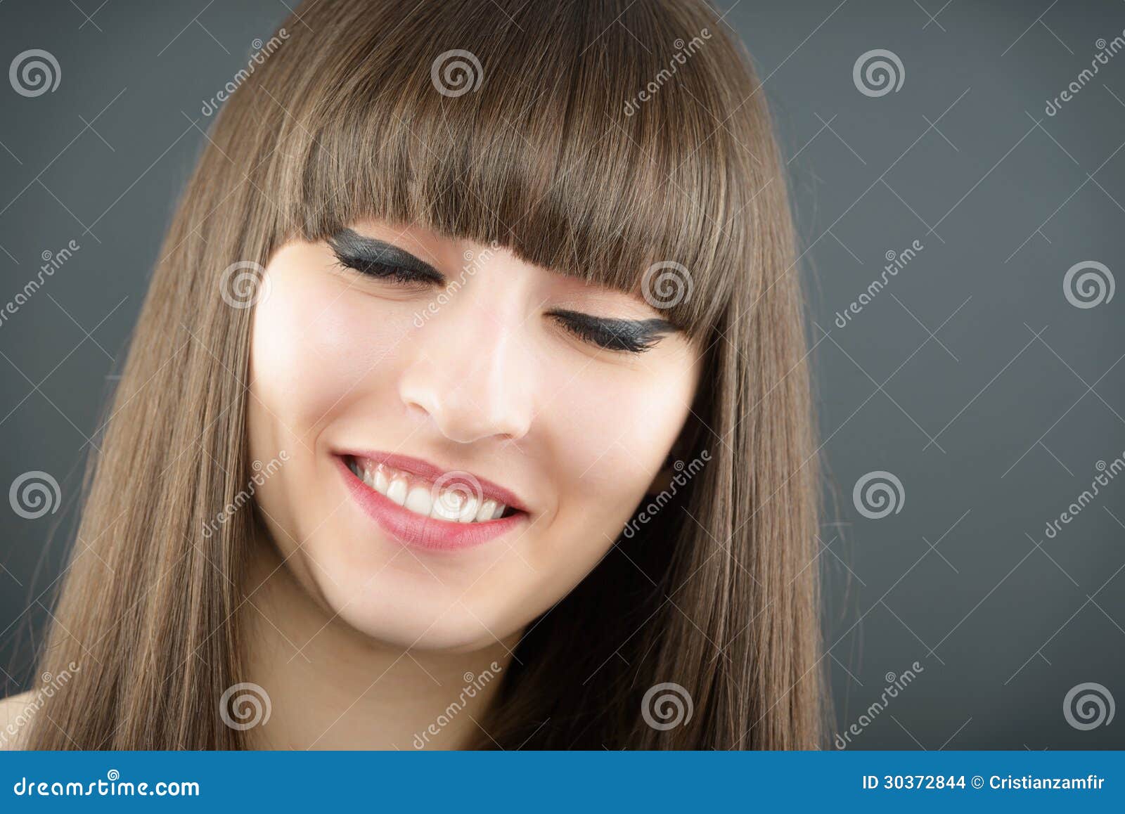 A Young Beautiful Woman with Bangs in Studio Stock Photo - Image of ...
