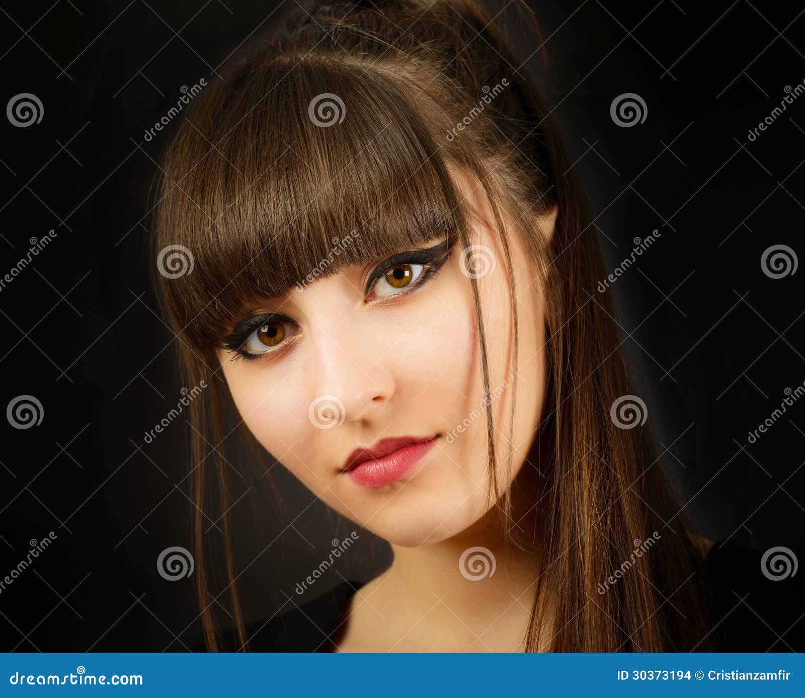 A Young Beautiful Woman with Bangs in Studio Stock Photo - Image of ...