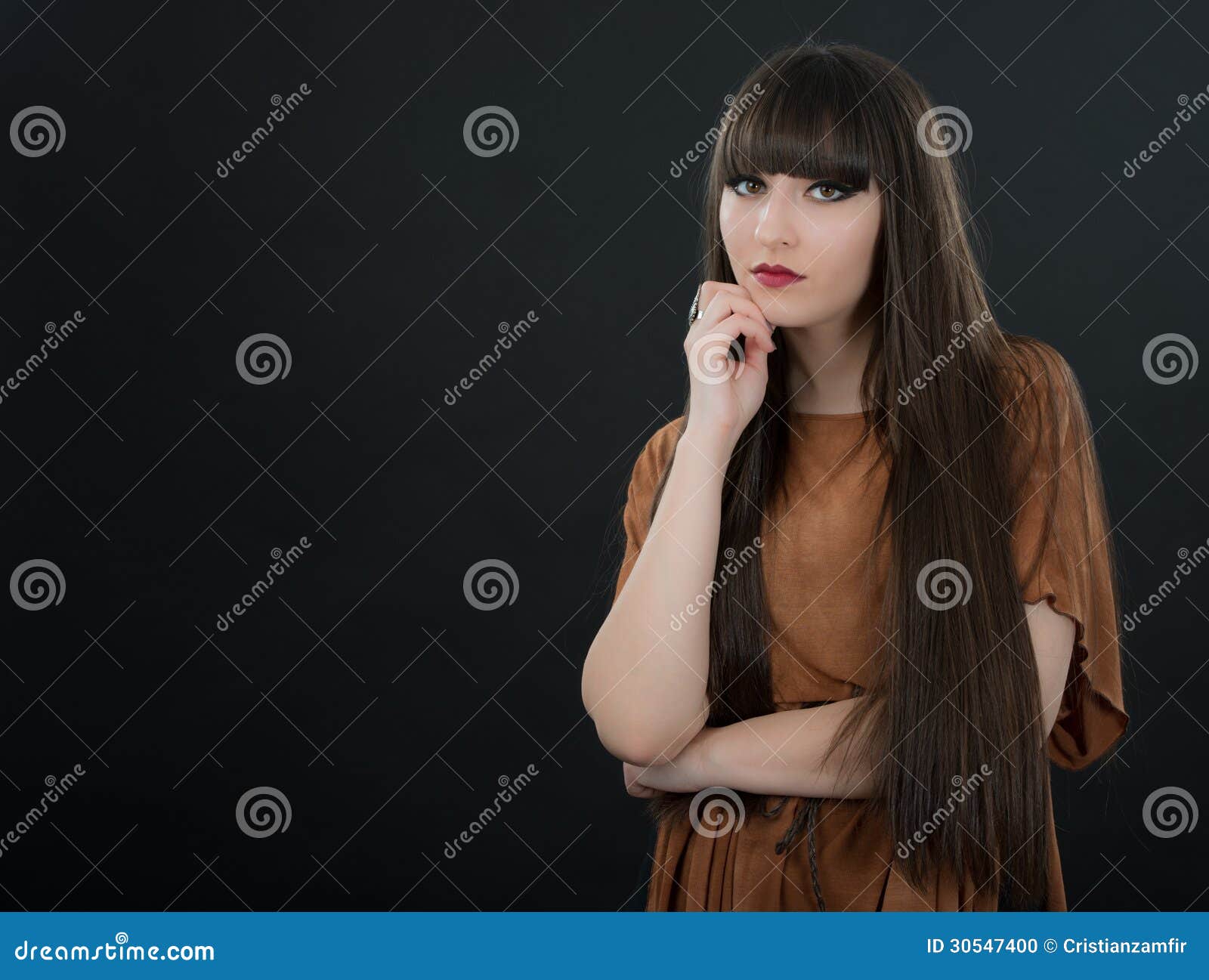 A Young Beautiful Woman with Bangs in Studio Stock Photo - Image of ...