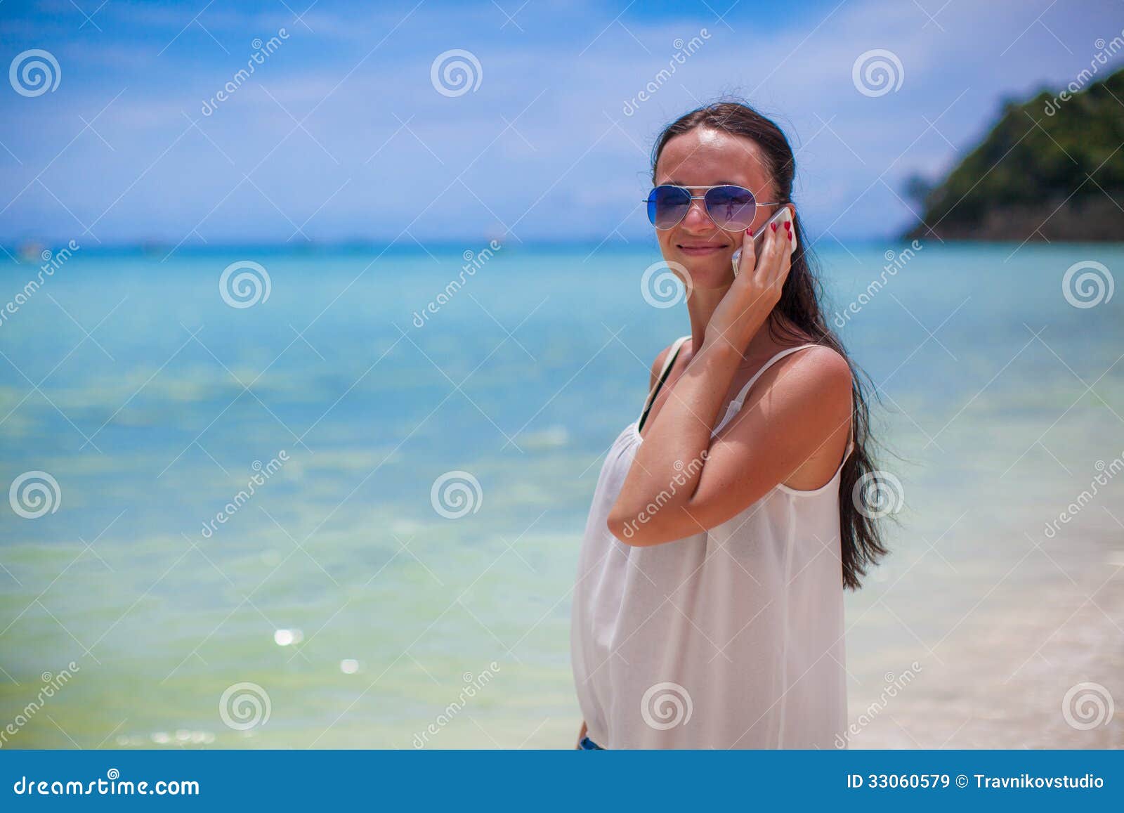 Young Beautiful Woman at the Beach Talking on Her Stock Image - Image ...