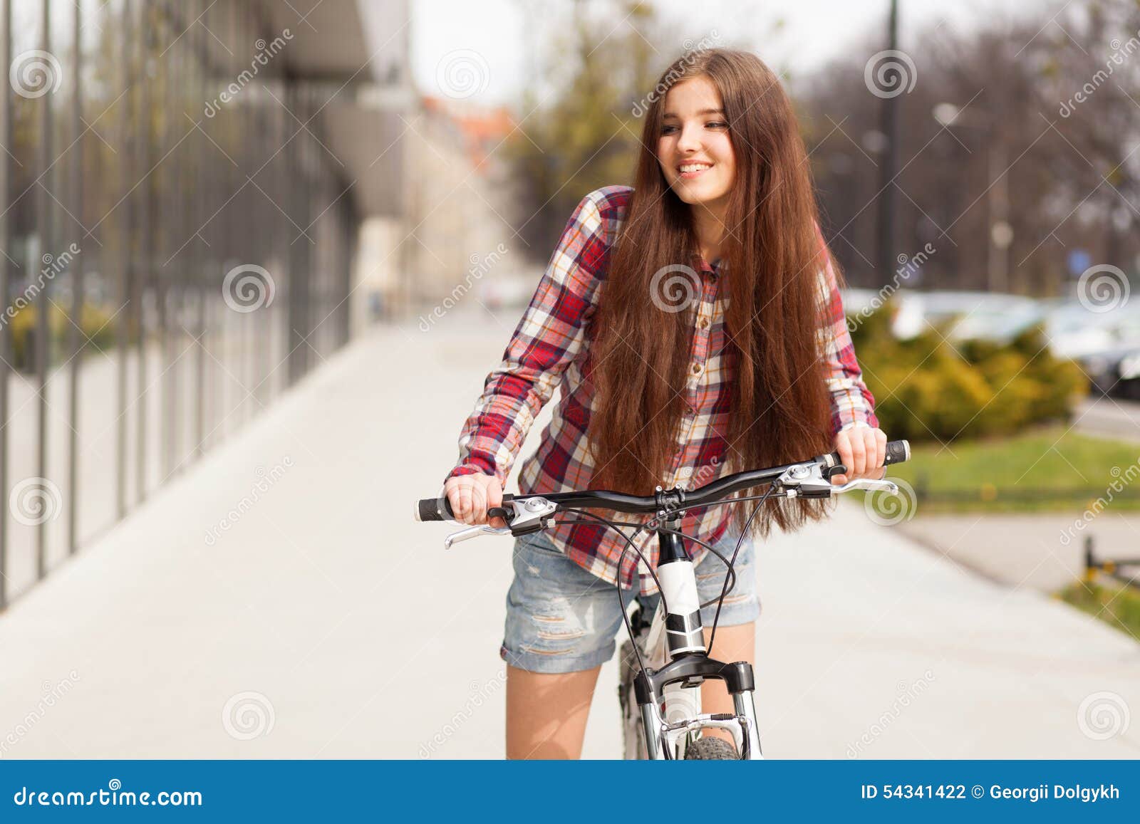 Young Beautiful Woman on a Bicycle Stock Photo - Image of checked ...