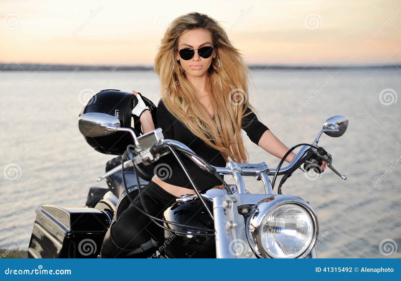 Young Beautiful Woman on a Bike Stock Photo - Image of woman, bike ...