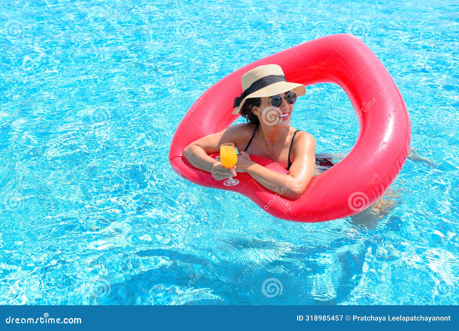 Young Beautiful Woman In Bikini Wear Hat And Sunglasses Relaxing In