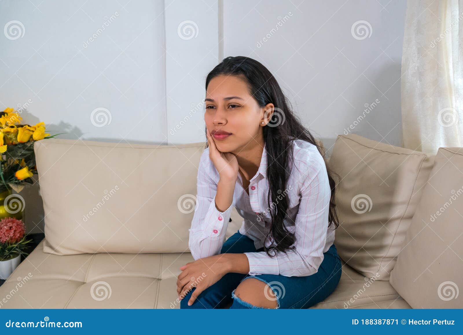 A Young and Beautiful Woman Concerned Stock Image - Image of hispanic ...